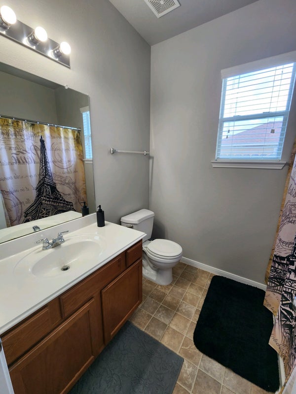 'Charming home near ExxonMobil & SpringWood Village' Room to Rent from ...