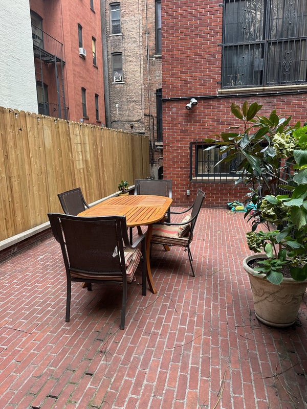 'Homey Triplex w/ Private Backyard Oasis' Room to Rent from SpareRoom